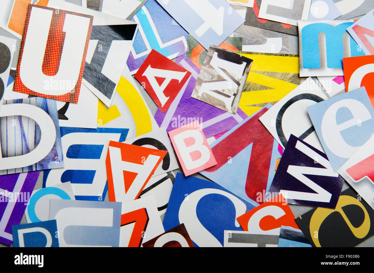 Newspaper clippings with various letters Stock Photo - Alamy