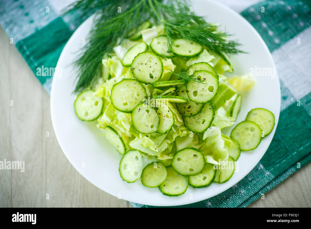 spring salad with cabbage and cucumbers Stock Photo - Alamy