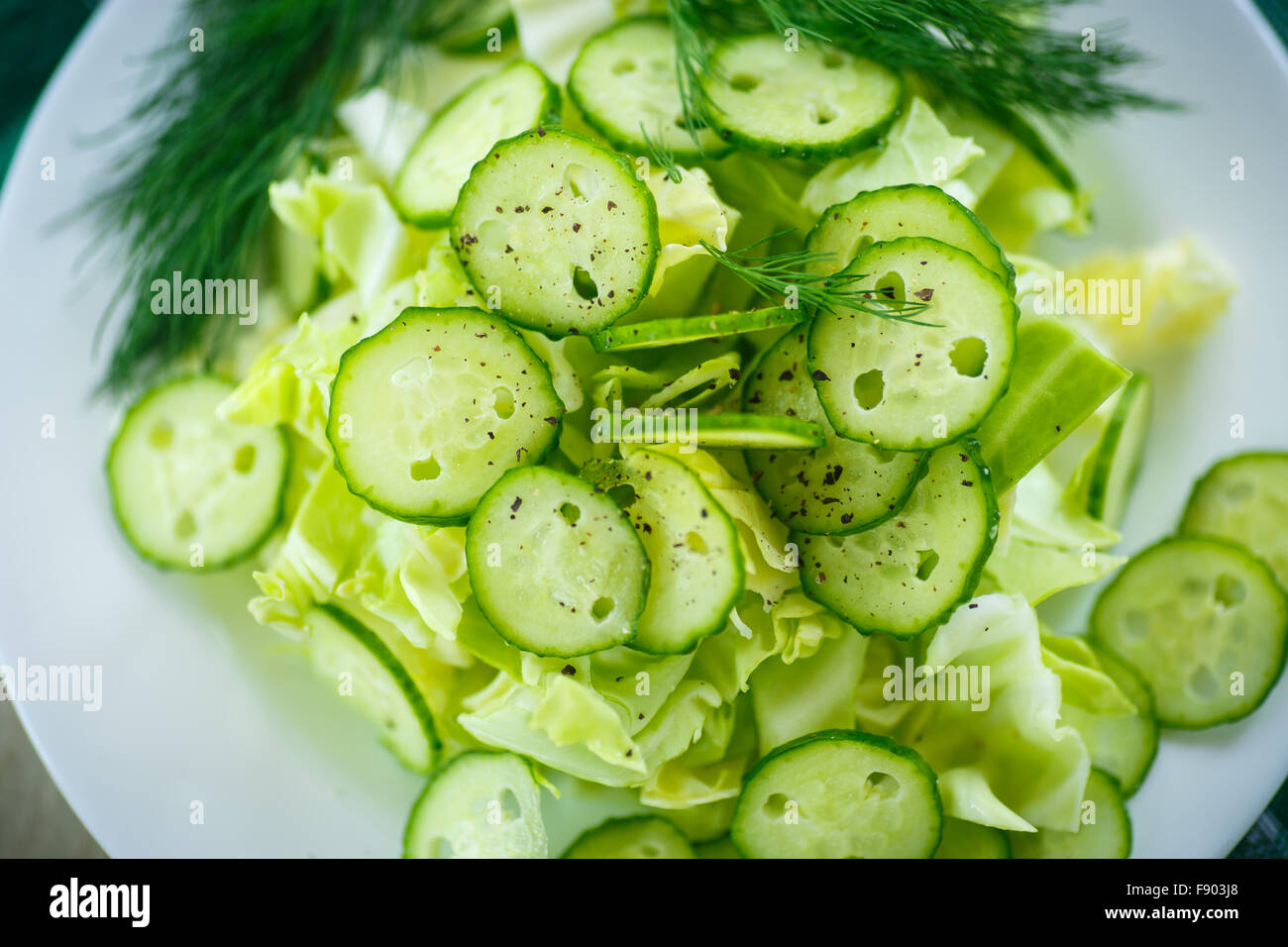 spring salad with cabbage and cucumbers Stock Photo - Alamy