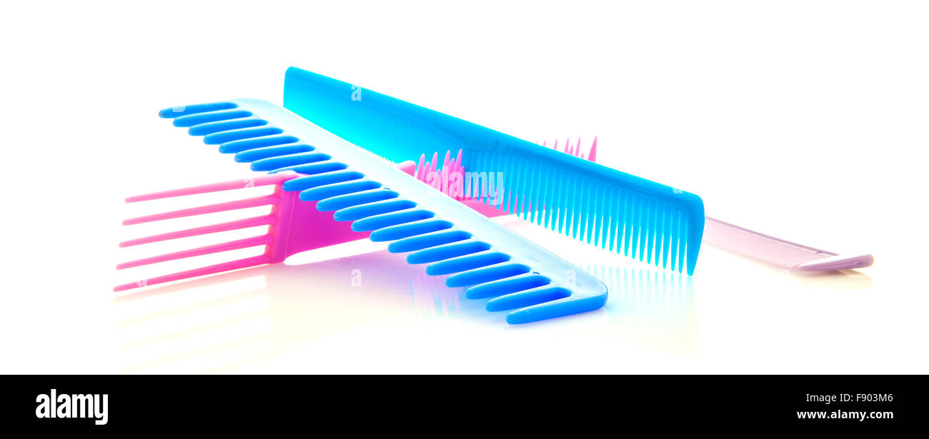 Colourful hair combs on white background Stock Photo - Alamy