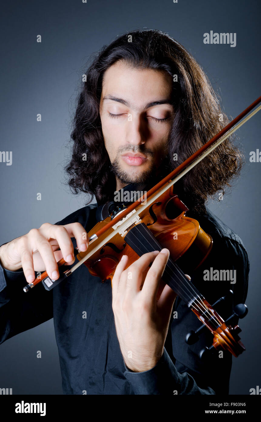 Violin player playing the intstrument Stock Photo - Alamy