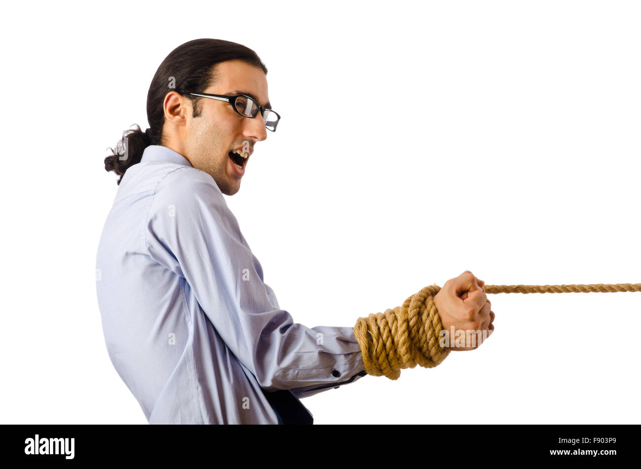 Young businessman tied with rope Stock Photo - Alamy