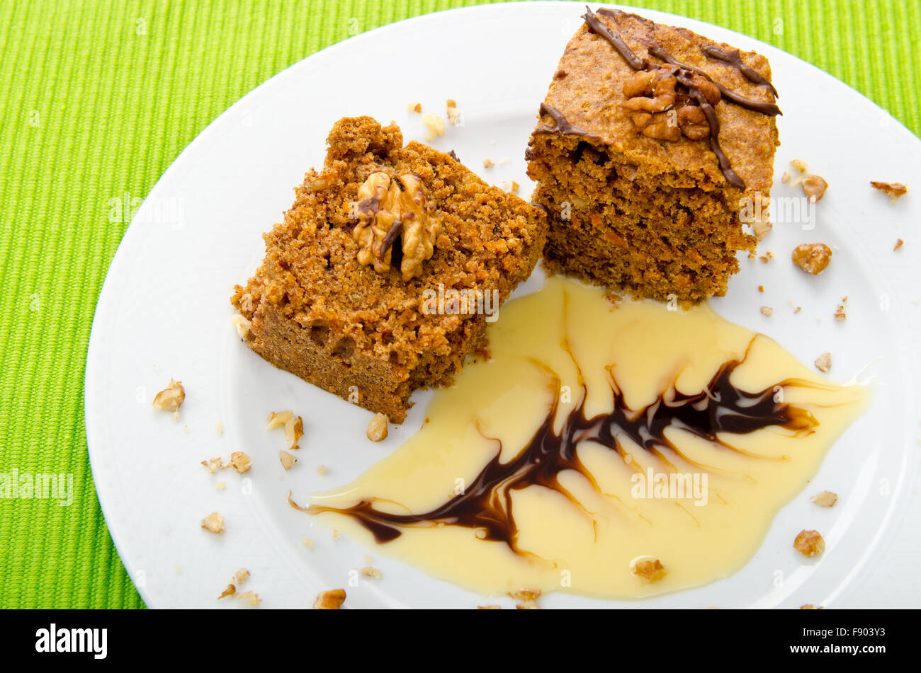 Cake with sweet sauce in plate Stock Photo - Alamy