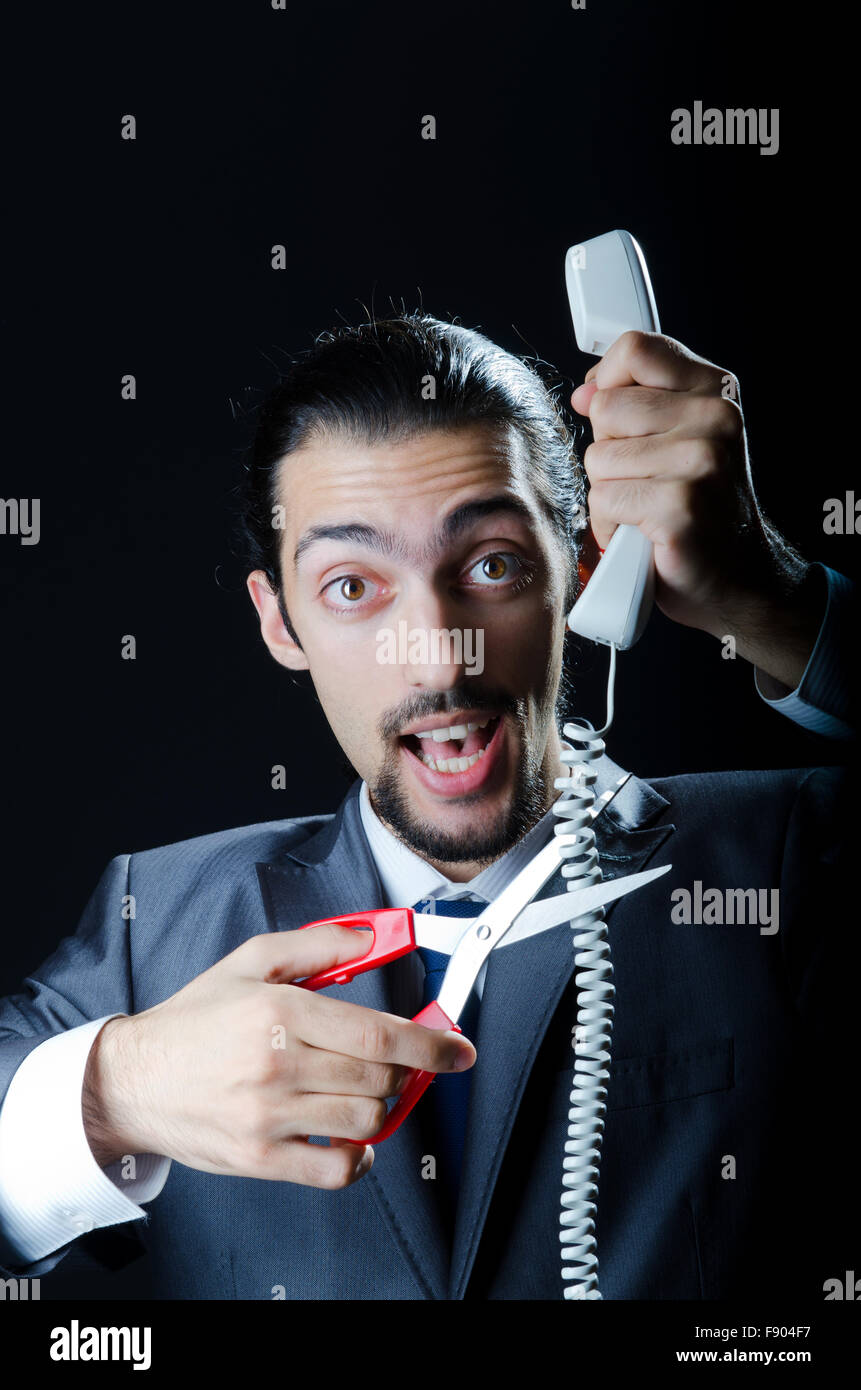 Scissors cutting telephone cord hi-res stock photography and images - Alamy