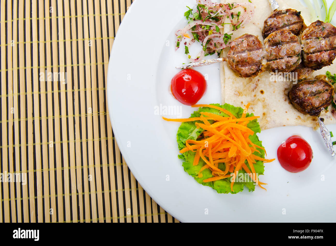 Meat cuisine - kebab served in plate Stock Photo - Alamy