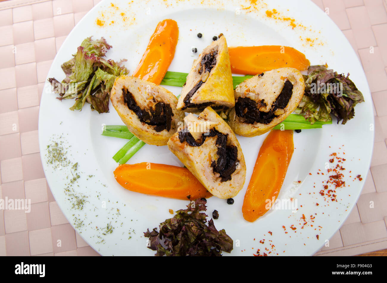 Meat and vegetable roll in plate Stock Photo - Alamy