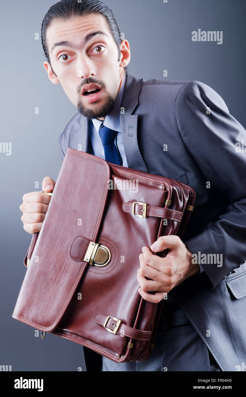 Business spy with briefcase Stock Photo - Alamy