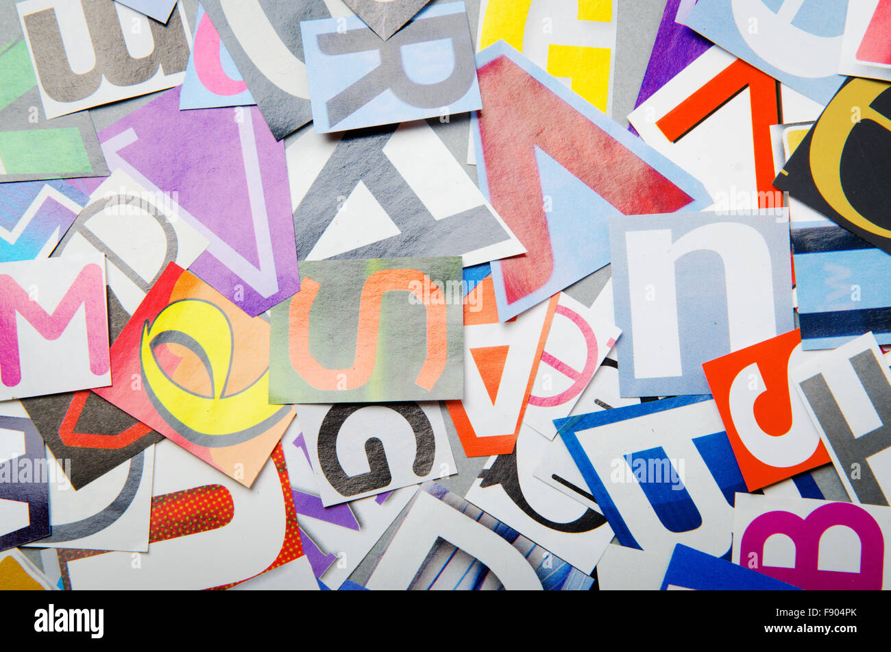 Newspaper clippings with various letters Stock Photo - Alamy