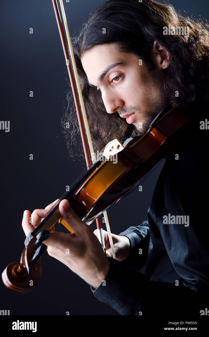 Young violin player playing Stock Photo - Alamy