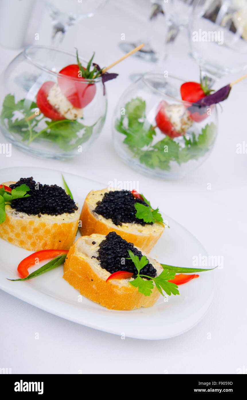 Black caviar in the plate Stock Photo - Alamy