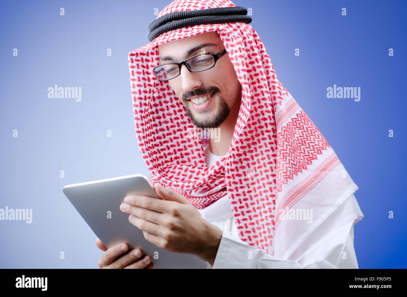 Young arab with tablet computer Stock Photo - Alamy