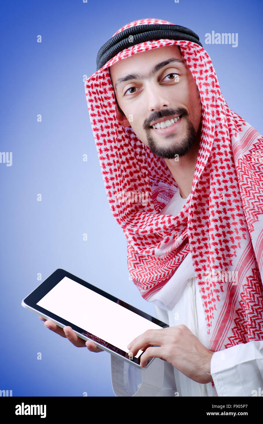Young arab with tablet computer Stock Photo - Alamy
