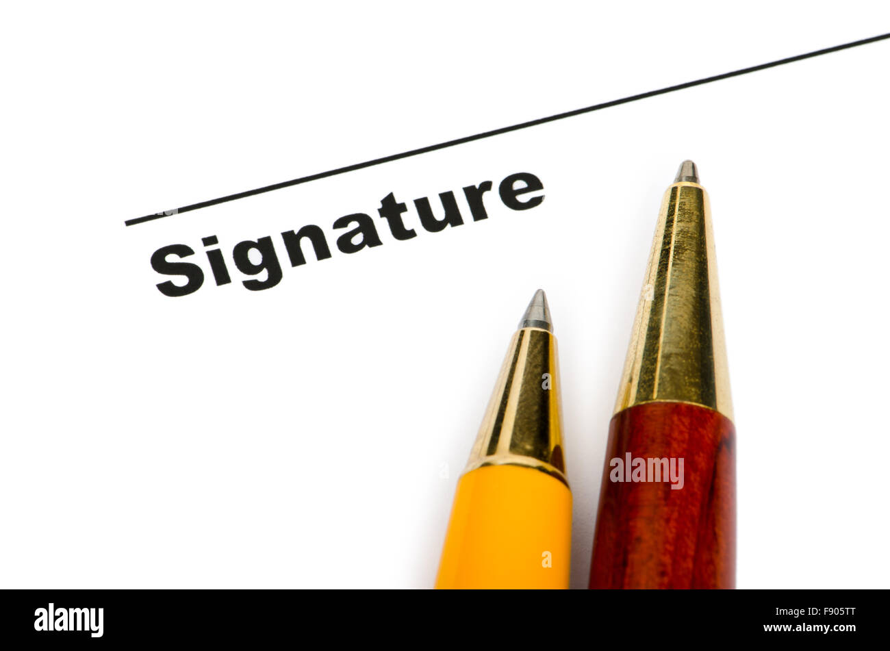 Pen and signature isolated on white Stock Photo - Alamy