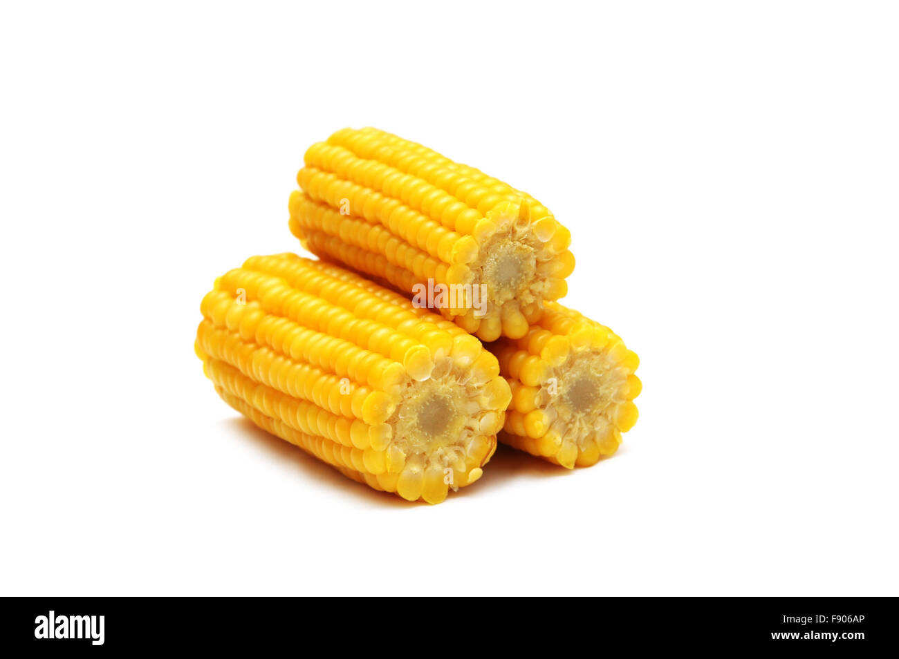 Three corn cobs isolated on the white background Stock Photo - Alamy