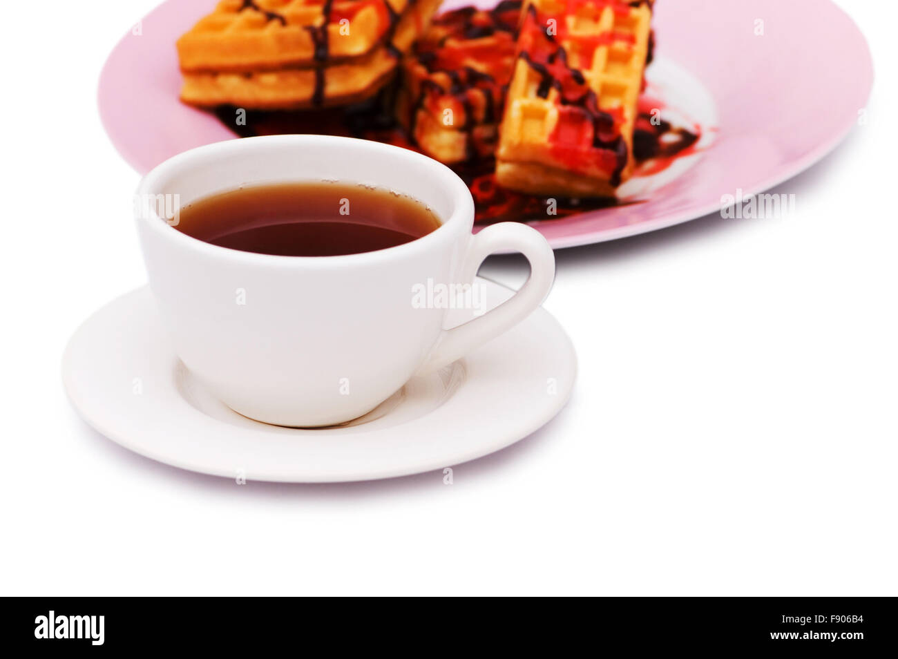 Tea and belgian waffles isolated on the white Stock Photo - Alamy