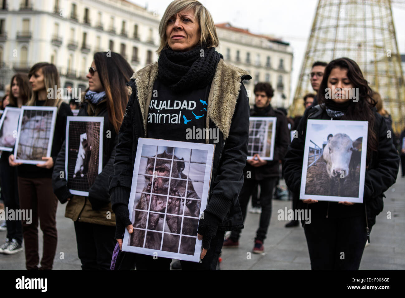 Madrid, Spain. 12th Dec, 2015. People protesting with pictures of ...