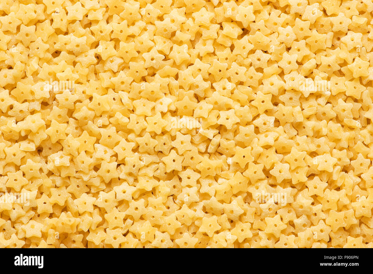 Background made of star shaped pasta pieces Stock Photo - Alamy