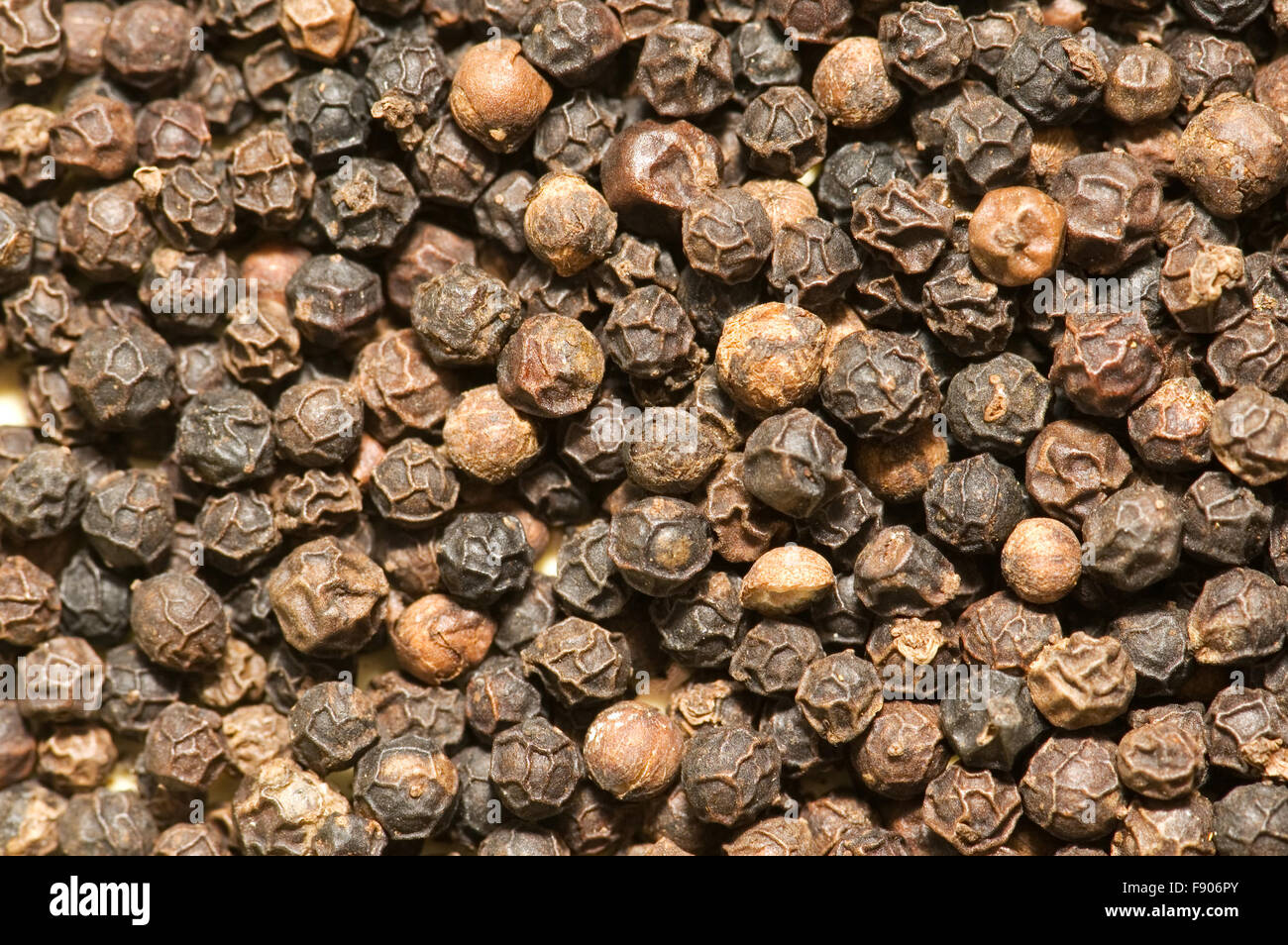 Background of black pepper - extreme close up Stock Photo - Alamy