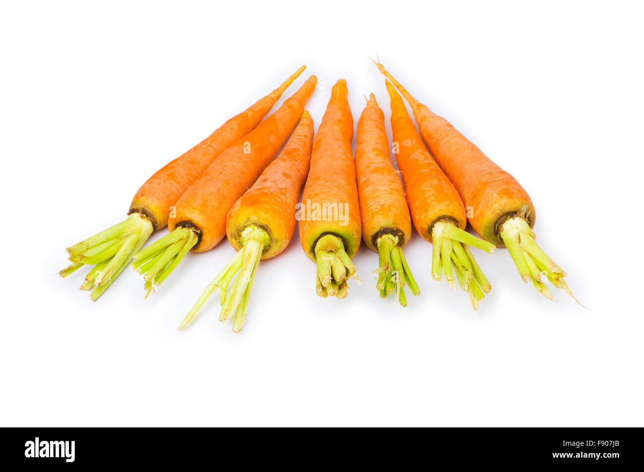 Many carrots isolated on the white background Stock Photo - Alamy