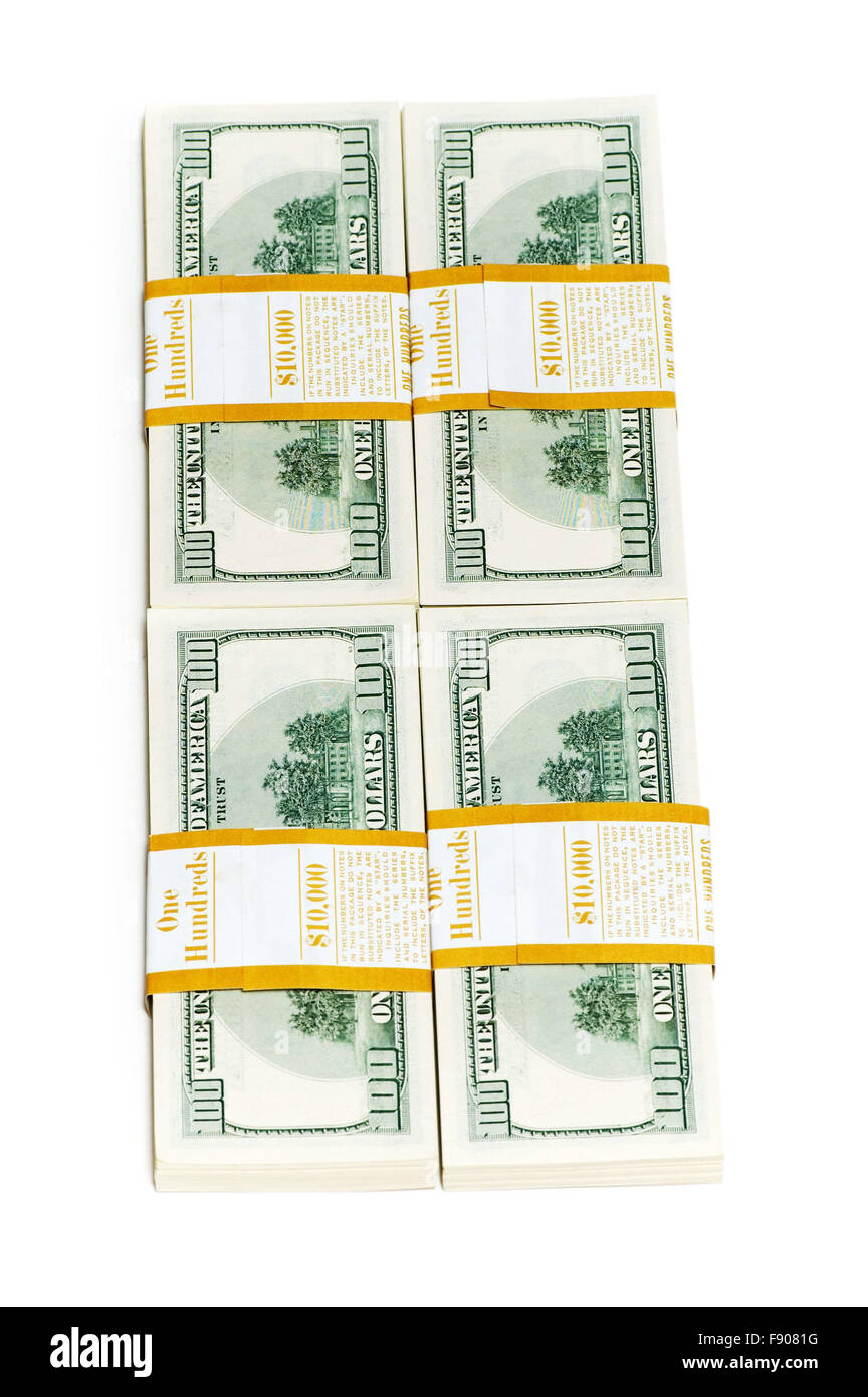 Ten thousand dollar stacks on the white Stock Photo - Alamy
