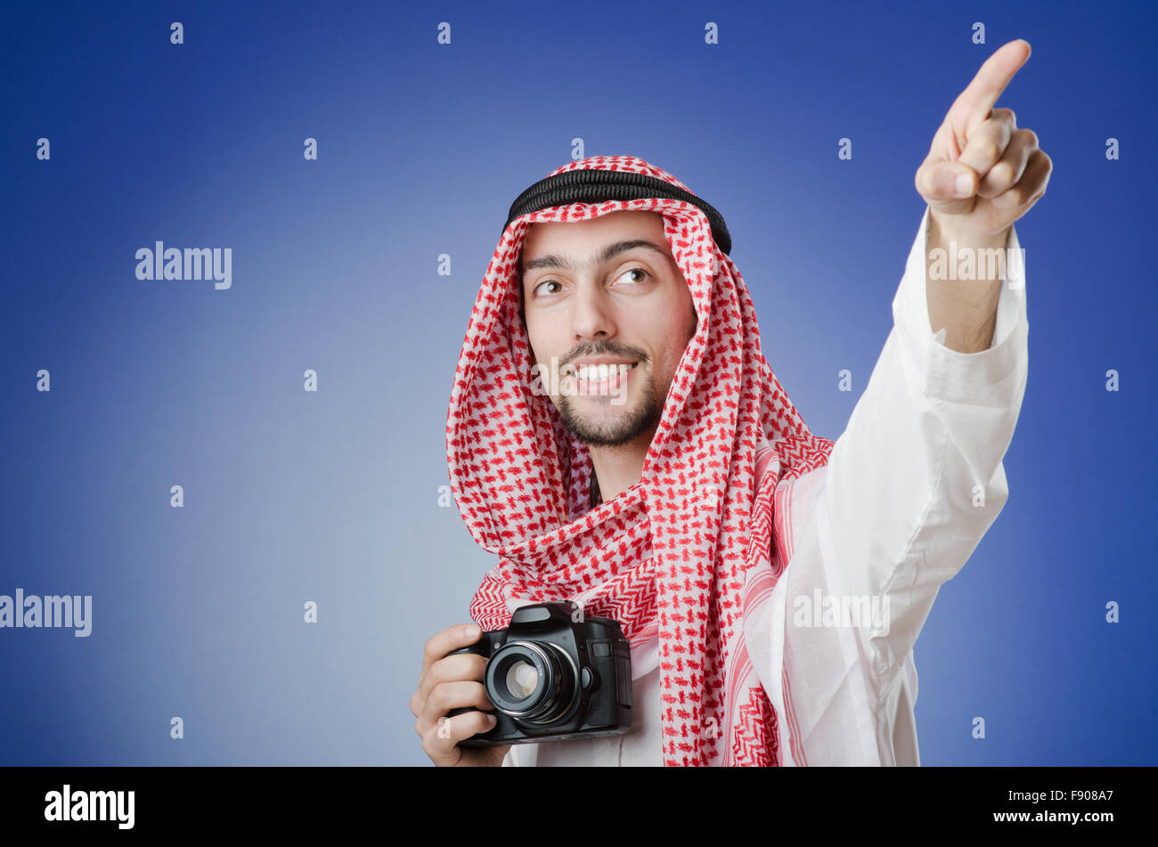 Arab photographer in studio shooting Stock Photo - Alamy