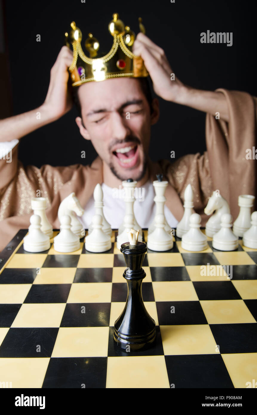 Chess player playing his game Stock Photo - Alamy