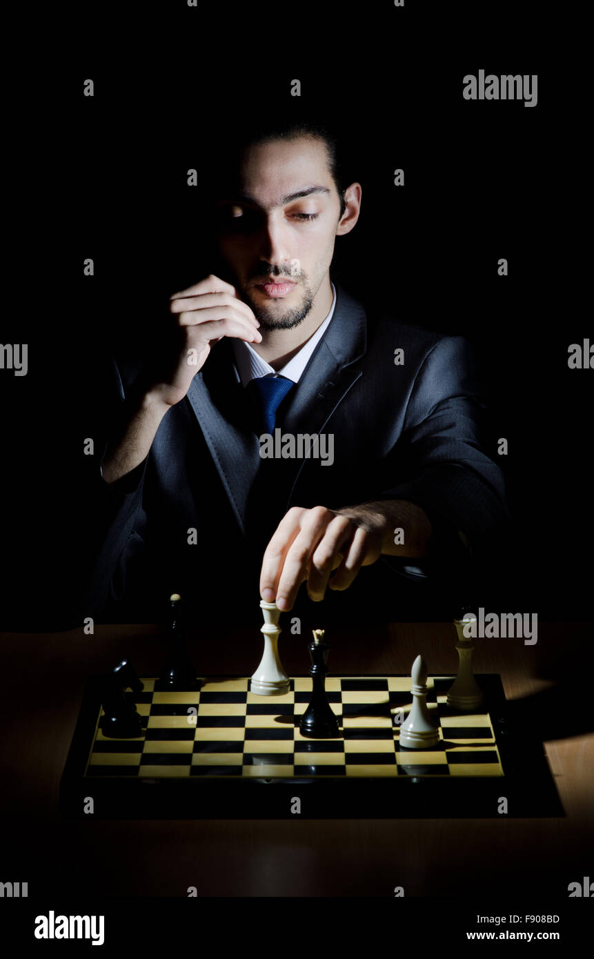 Chess player playing his game Stock Photo - Alamy