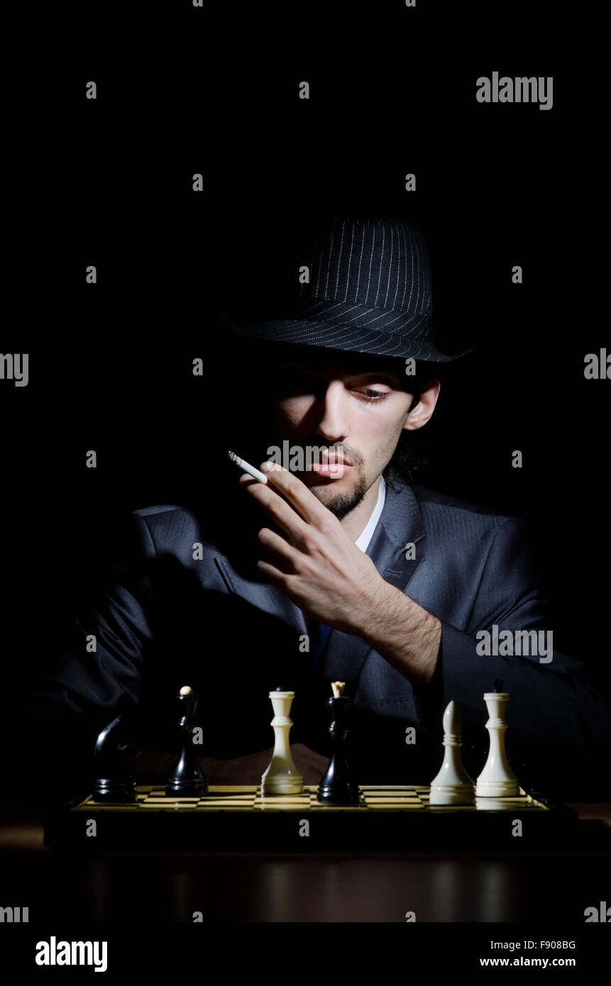 Chess player playing his game Stock Photo - Alamy