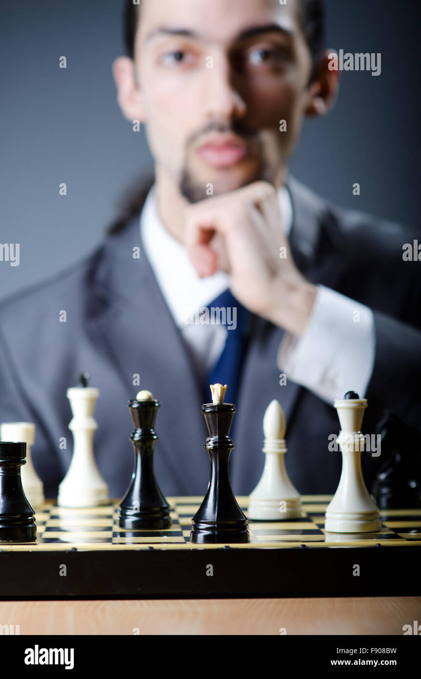 Chess player playing his game Stock Photo - Alamy