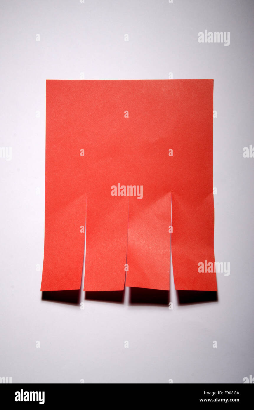 Tear off paper notice on the wall Stock Photo - Alamy