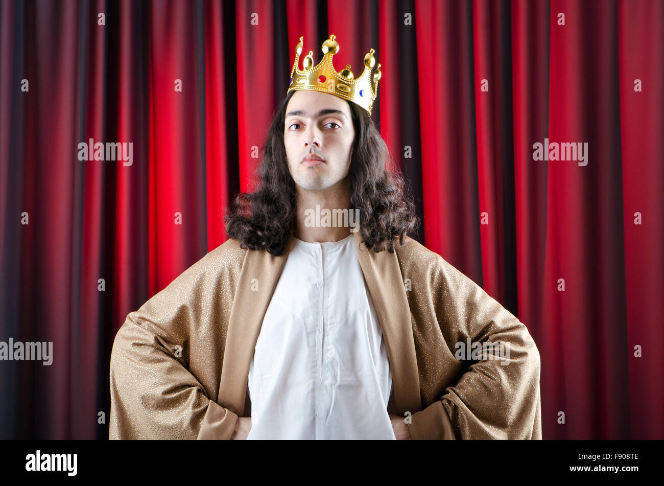 King with crown against background Stock Photo - Alamy