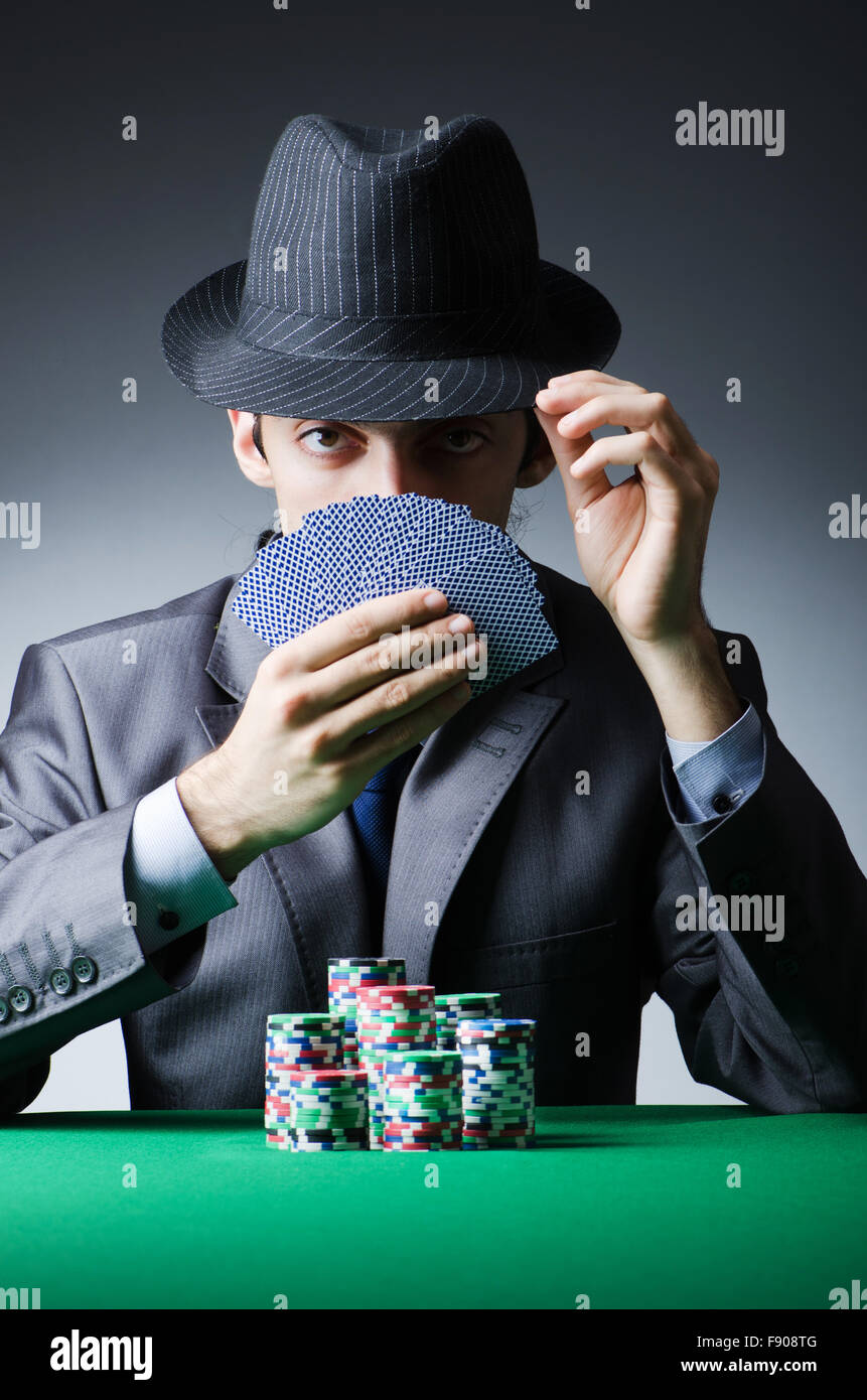 Man playing in the casino Stock Photo - Alamy