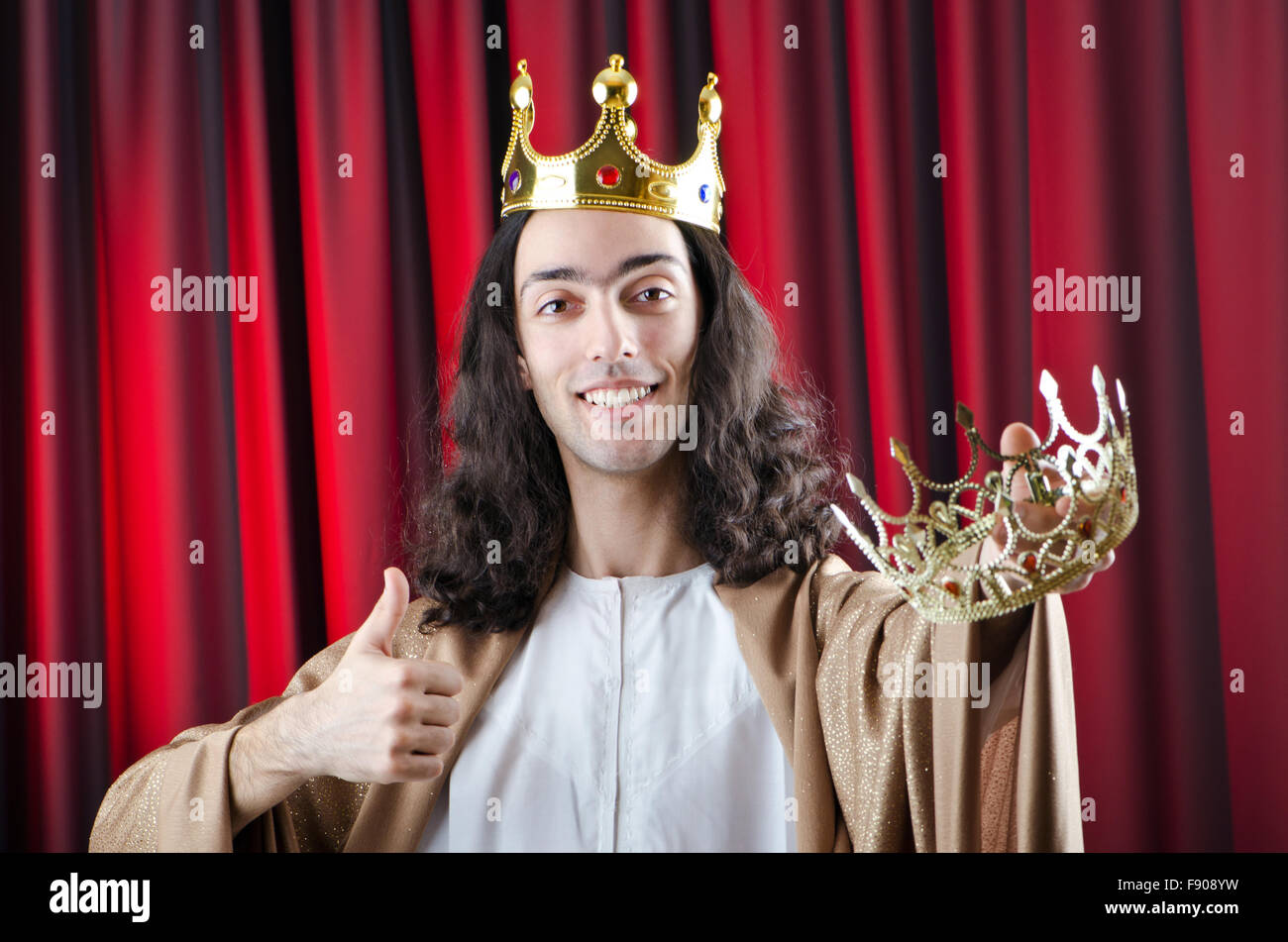 King with crown against background Stock Photo - Alamy