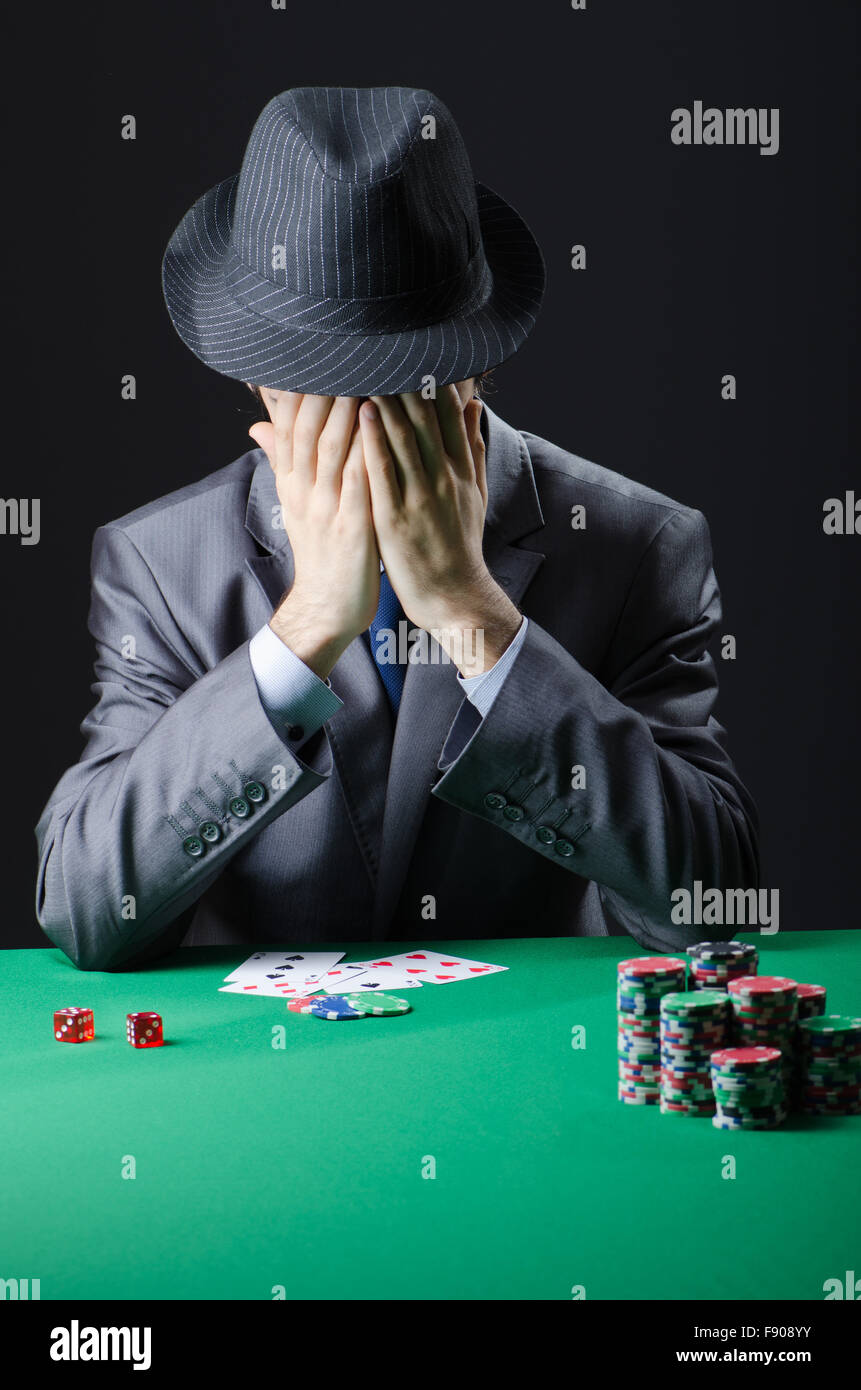 Man playing in the casino Stock Photo - Alamy