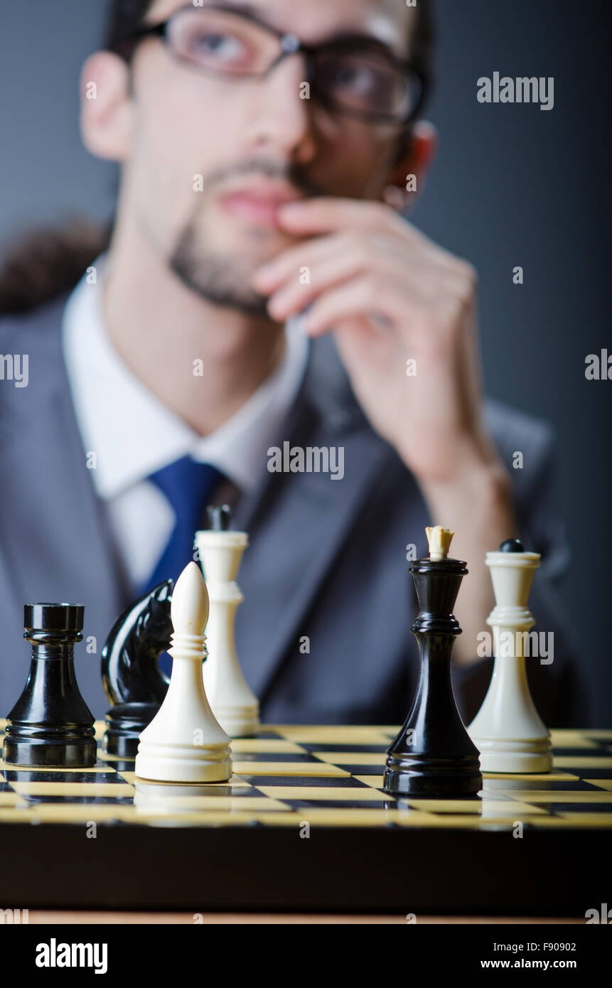 Chess player playing his game Stock Photo - Alamy