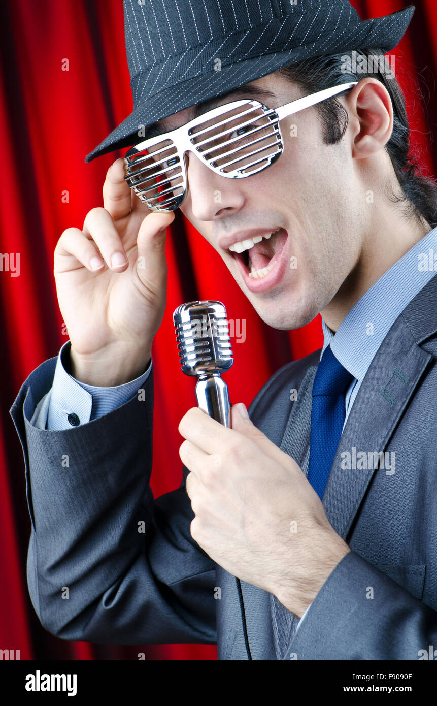 Man performing at the concert Stock Photo - Alamy