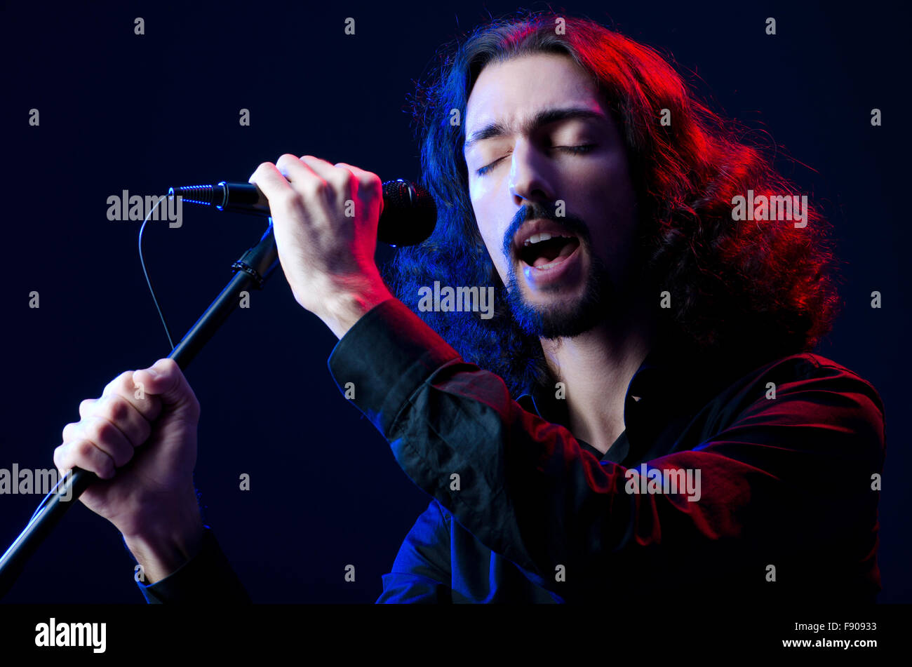 Man singing at the concert Stock Photo - Alamy
