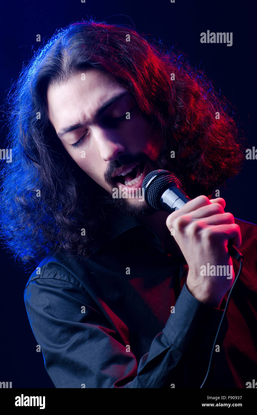 Man singing at the concert Stock Photo - Alamy