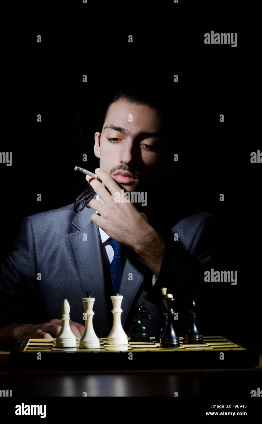 Chess player playing his game Stock Photo - Alamy