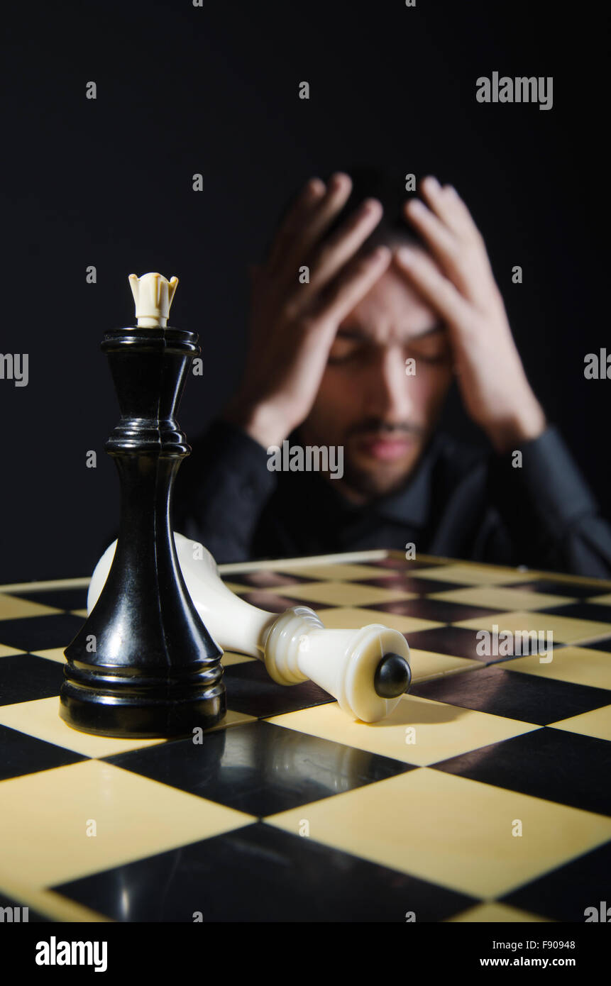 Chess player playing his game Stock Photo - Alamy