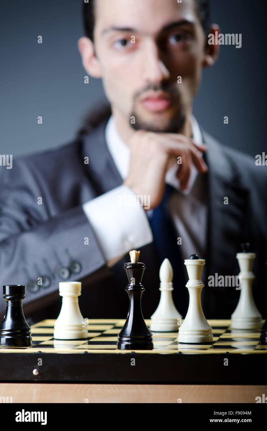 Chess player playing his game Stock Photo - Alamy