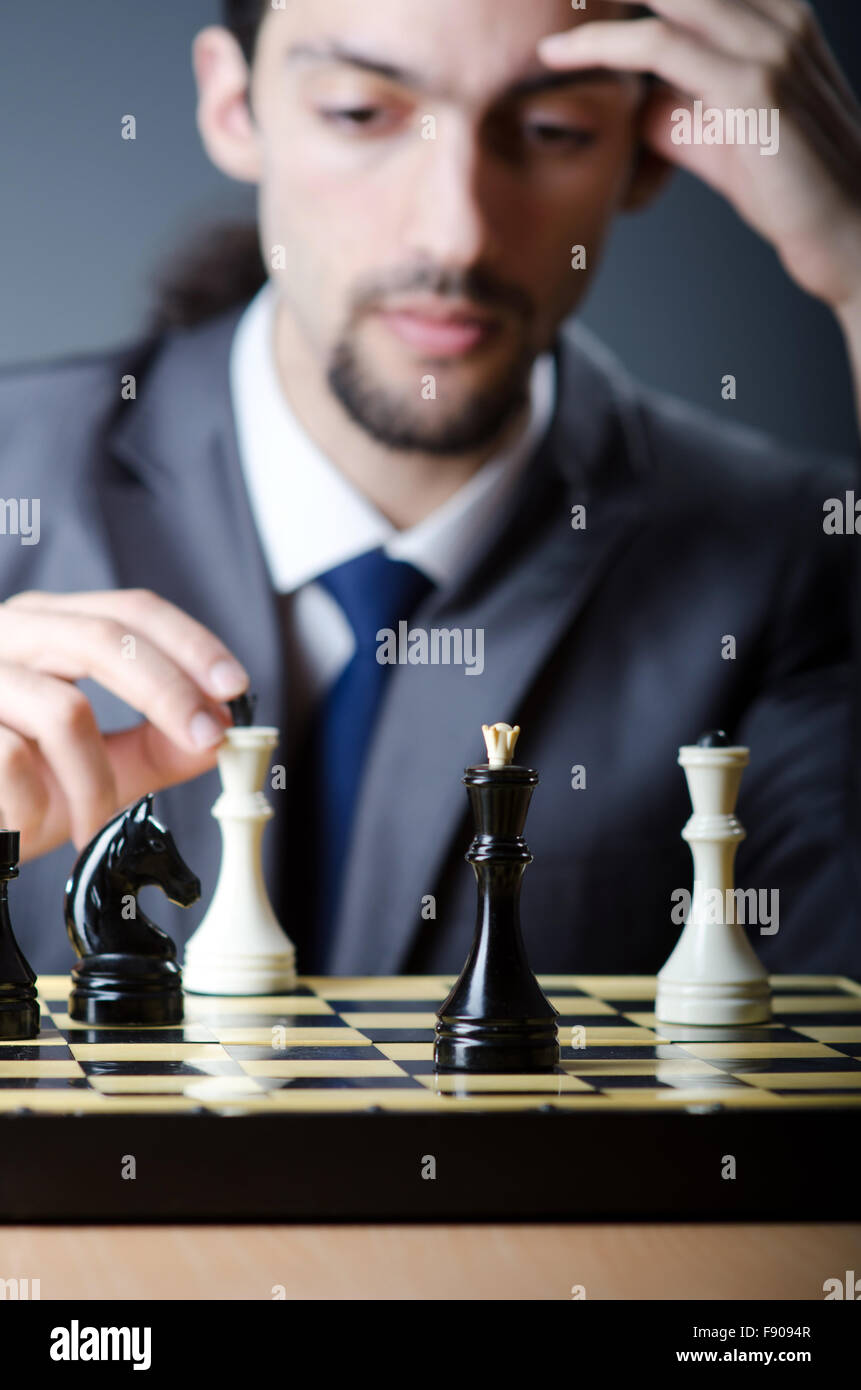 Chess player playing his game Stock Photo - Alamy
