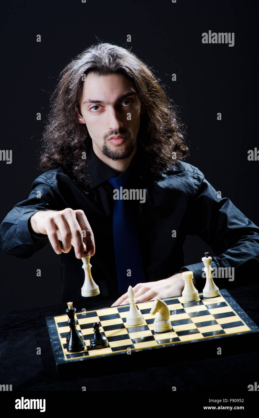 Chess player playing his game Stock Photo - Alamy