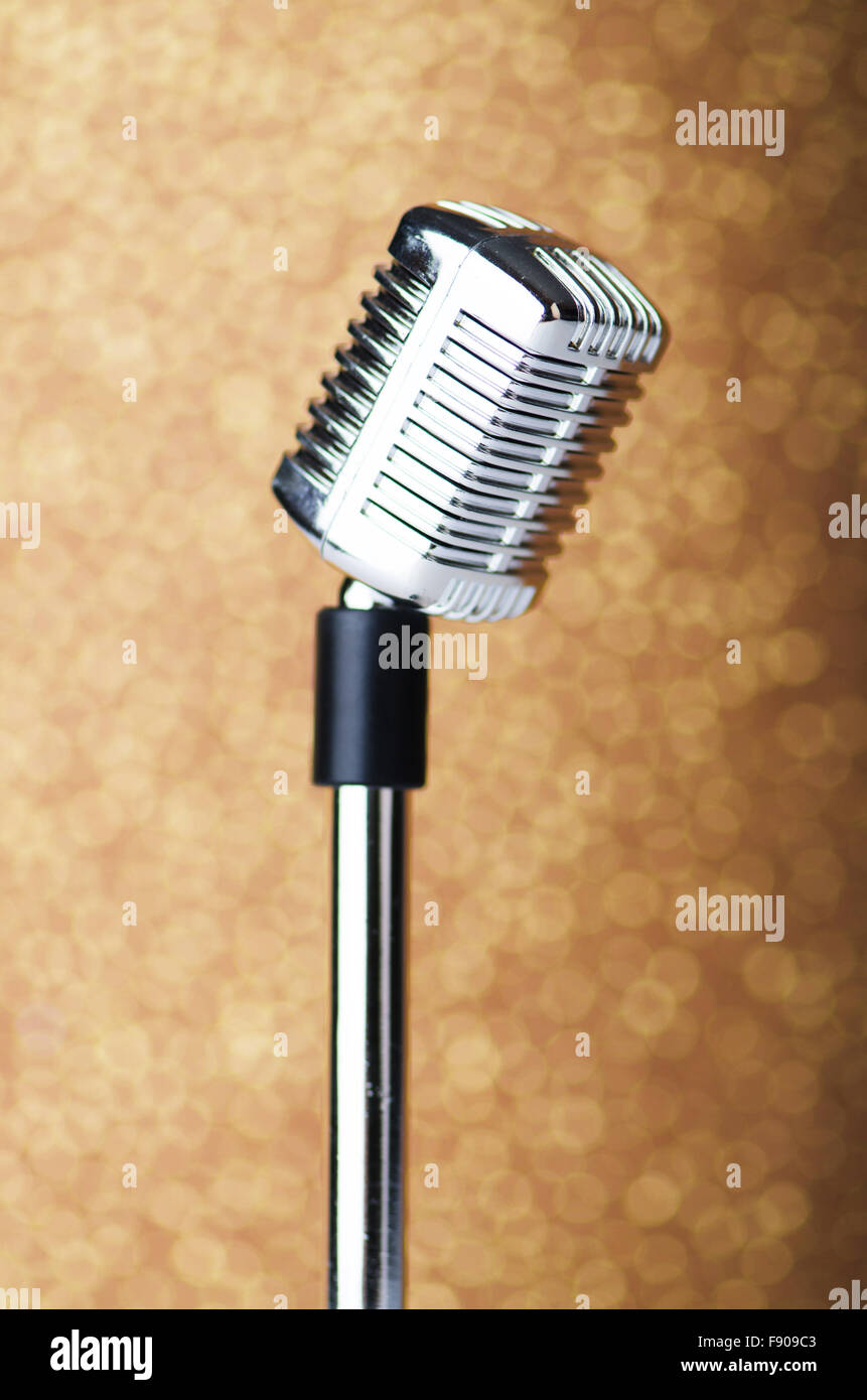 Old vintage microphone on background Stock Photo - Alamy