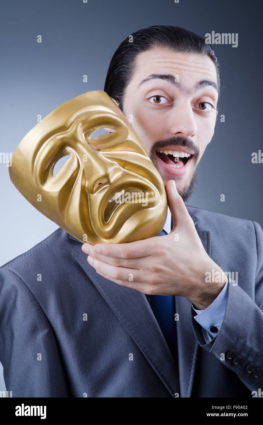 Businessman with mask concealing his identity Stock Photo - Alamy