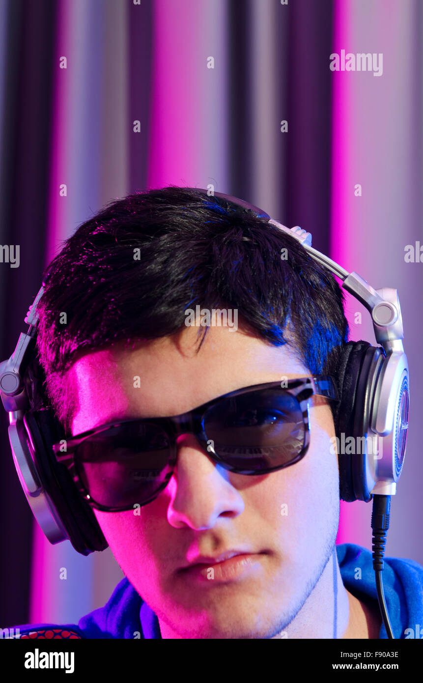 Young DJ playing his music Stock Photo - Alamy