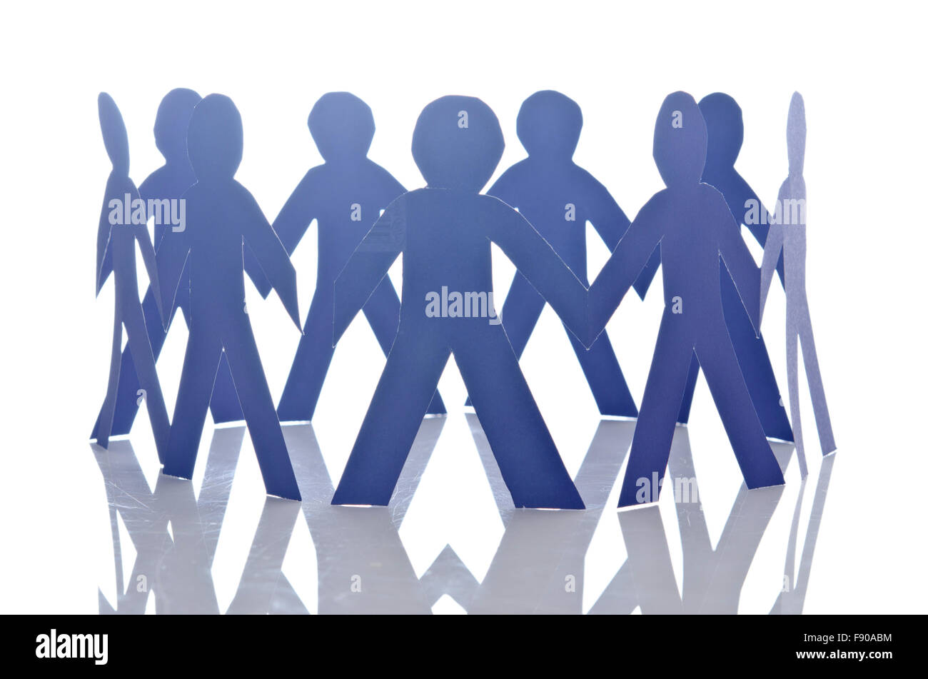 Teamwork concept with paper cut people Stock Photo - Alamy