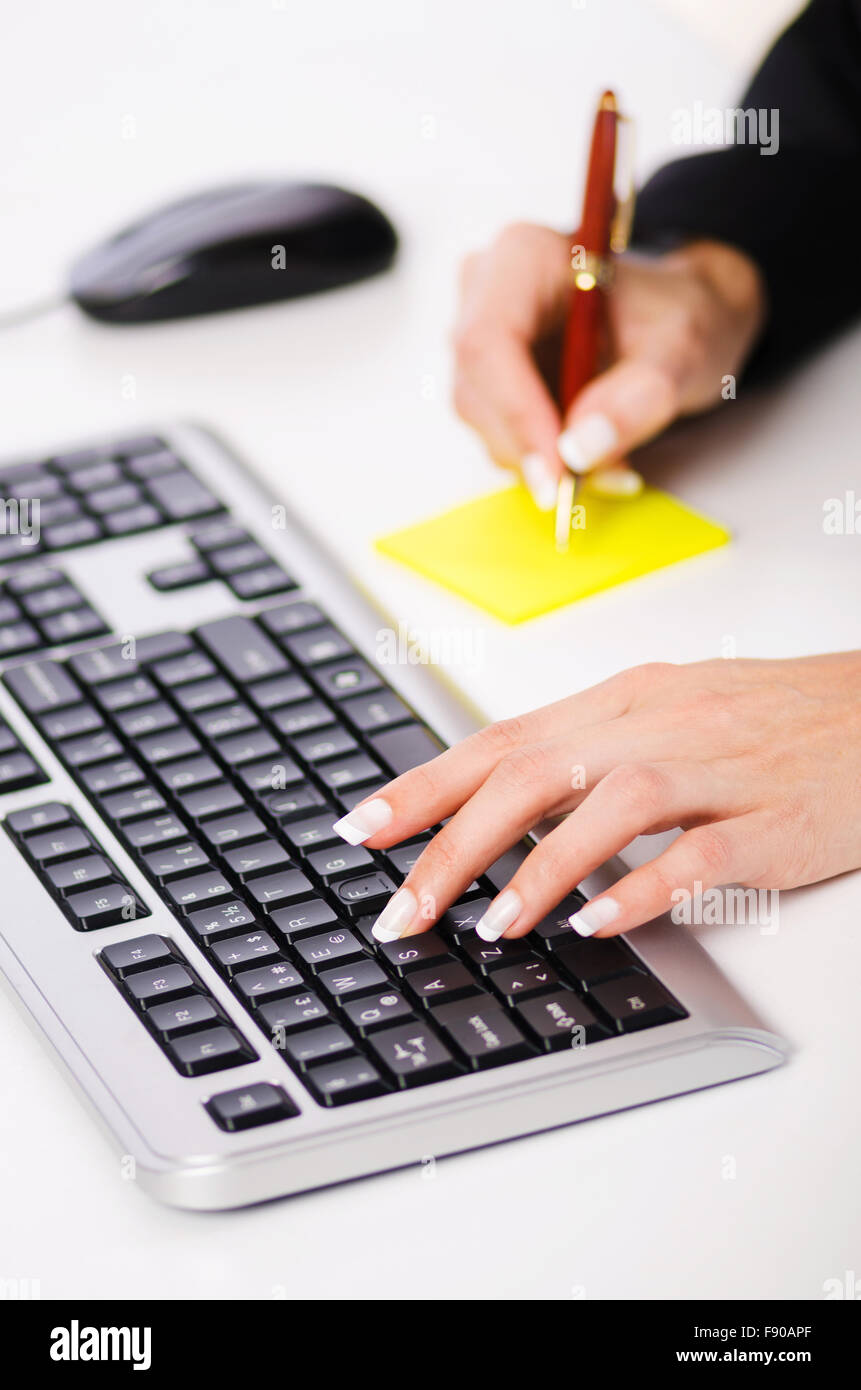 Hands working on the keyboard Stock Photo - Alamy