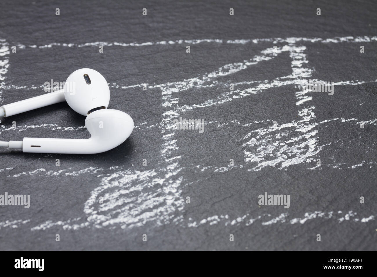 Music notes with headphones Stock Photo - Alamy