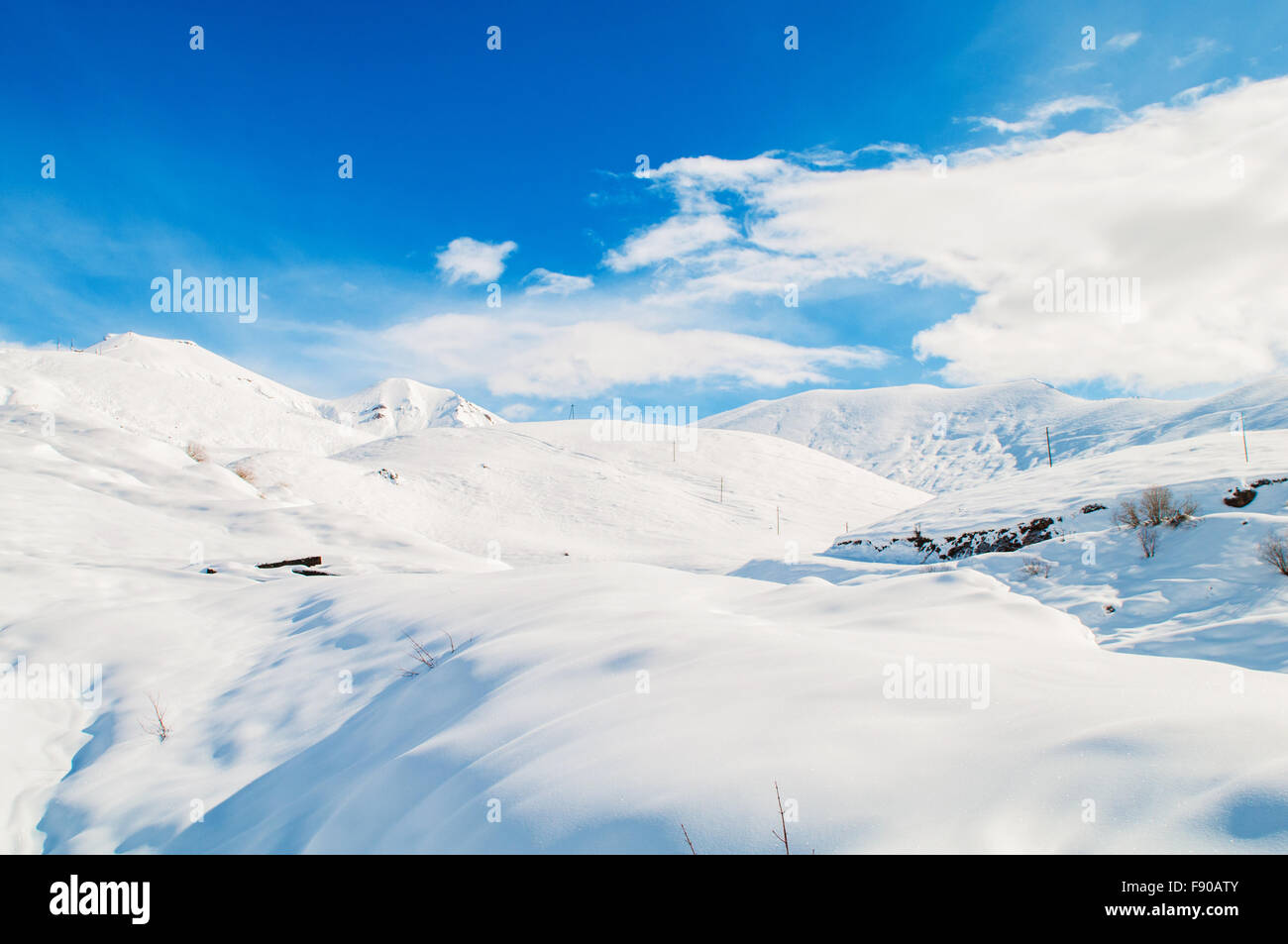 Snow mountains on bright winter day Stock Photo - Alamy